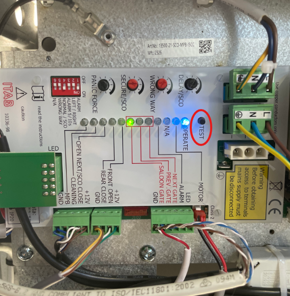08. Press the test button on the main PCB on each gate – Radford Retail